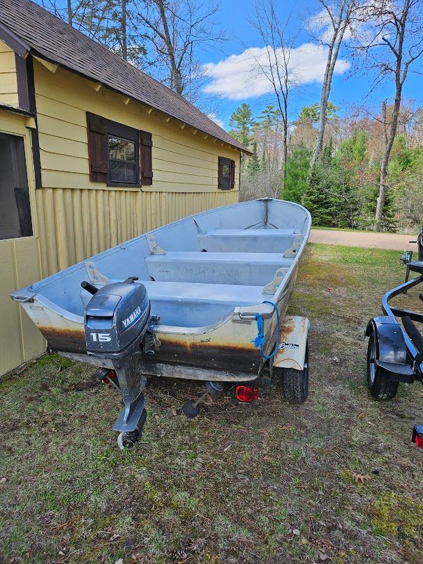 14 foot fishing boat with 15 h.p. outboard motor | Twin Waters Rentals